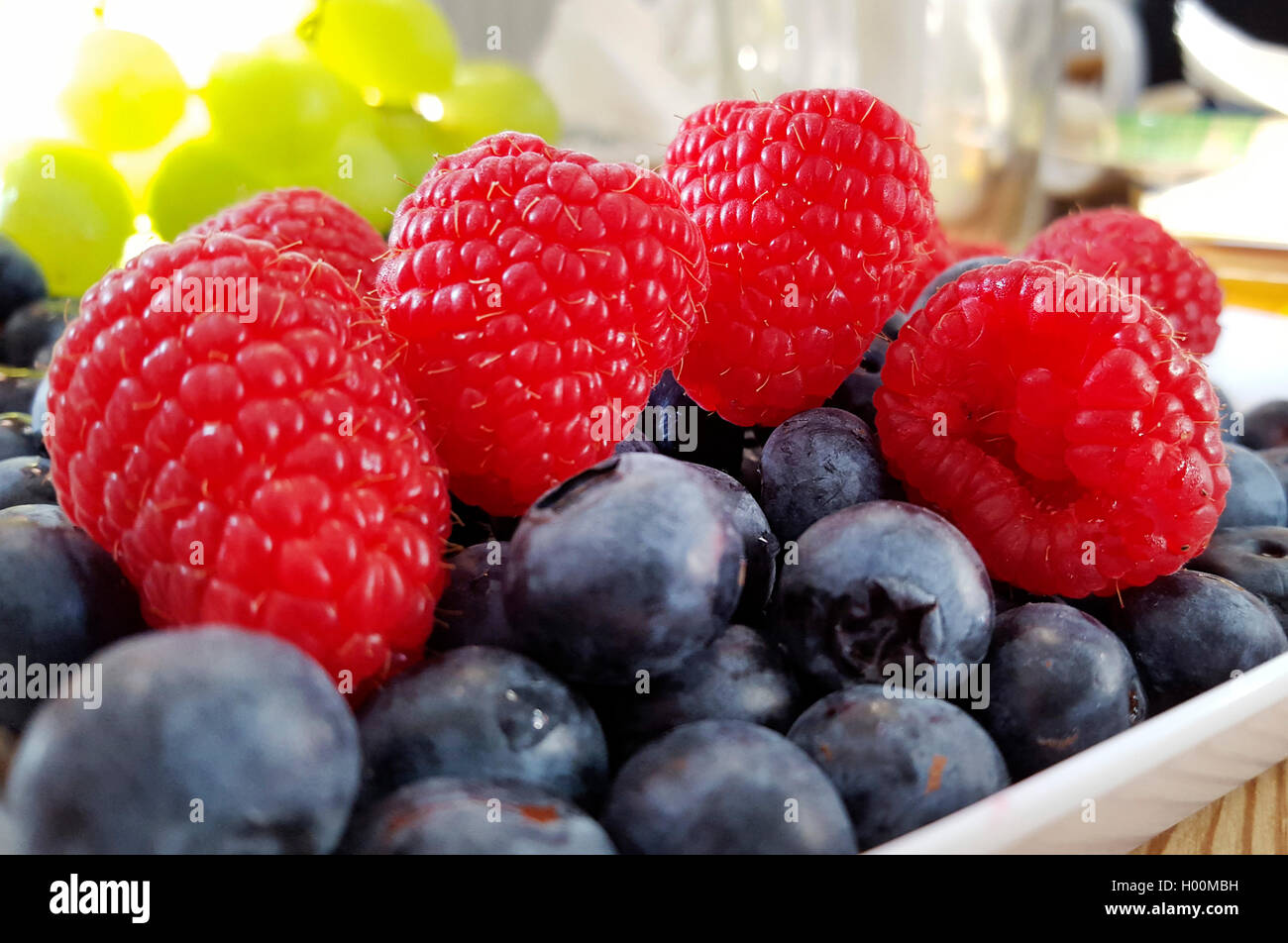 European red raspberry (Rubus idaeus), fruit bowl with raspberries ...