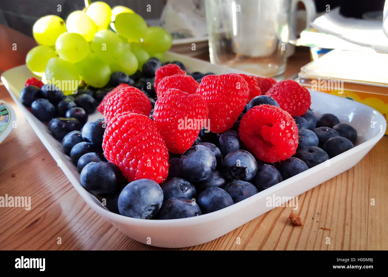 European red raspberry (Rubus idaeus), fruit bowl with raspberries ...