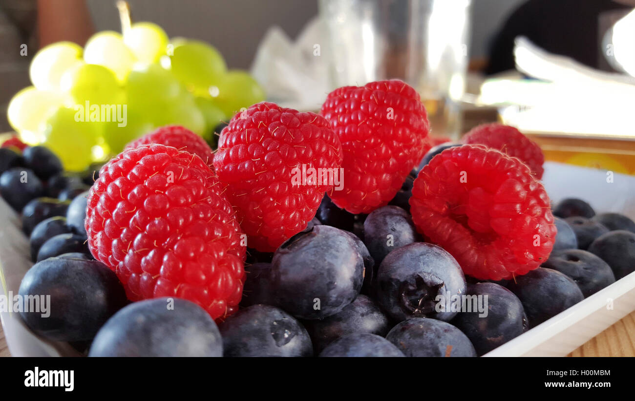 European red raspberry (Rubus idaeus), fruit bowl with raspberries ...