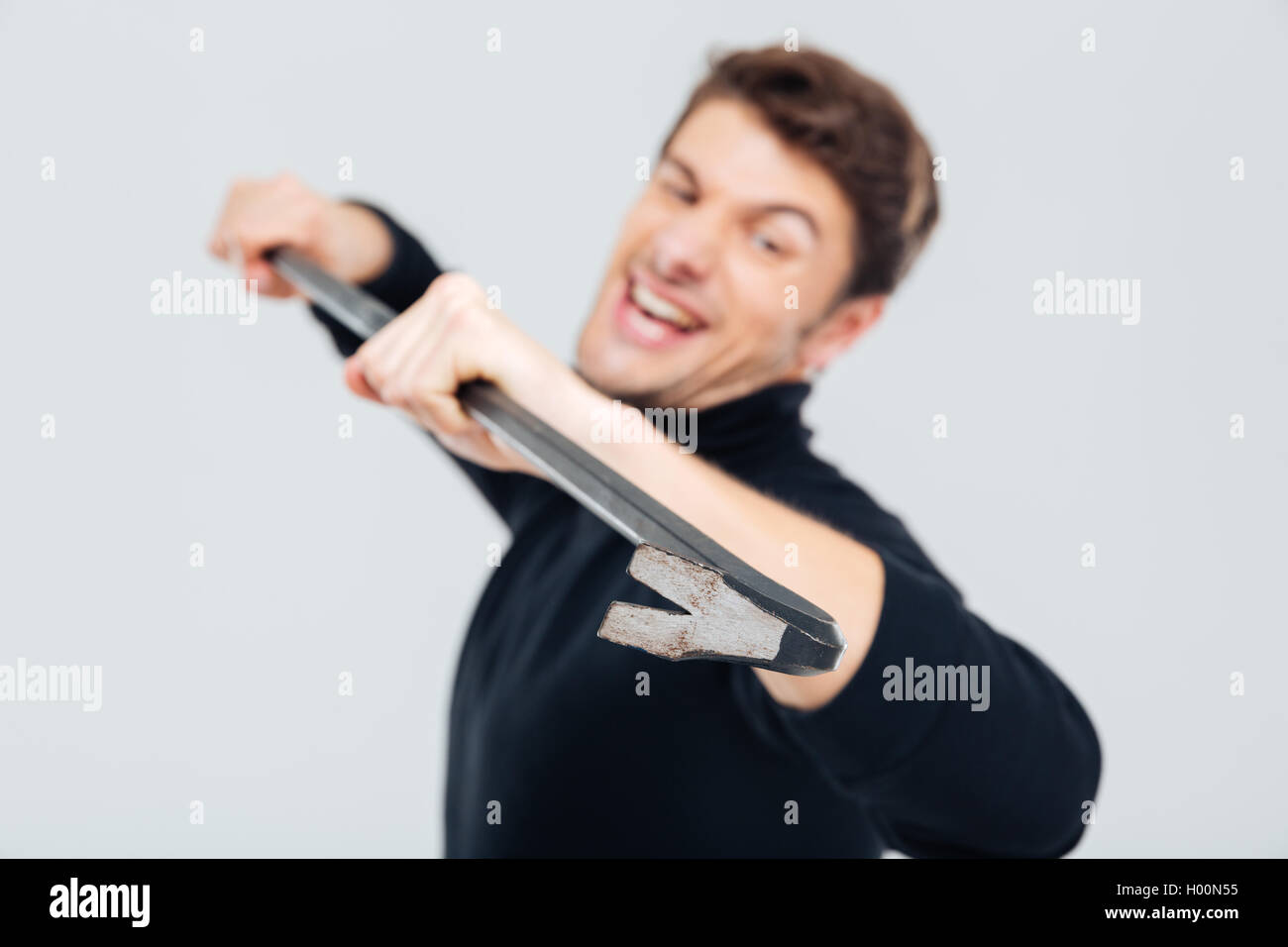 Burglar hand holding crowbar hi-res stock photography and images - Alamy
