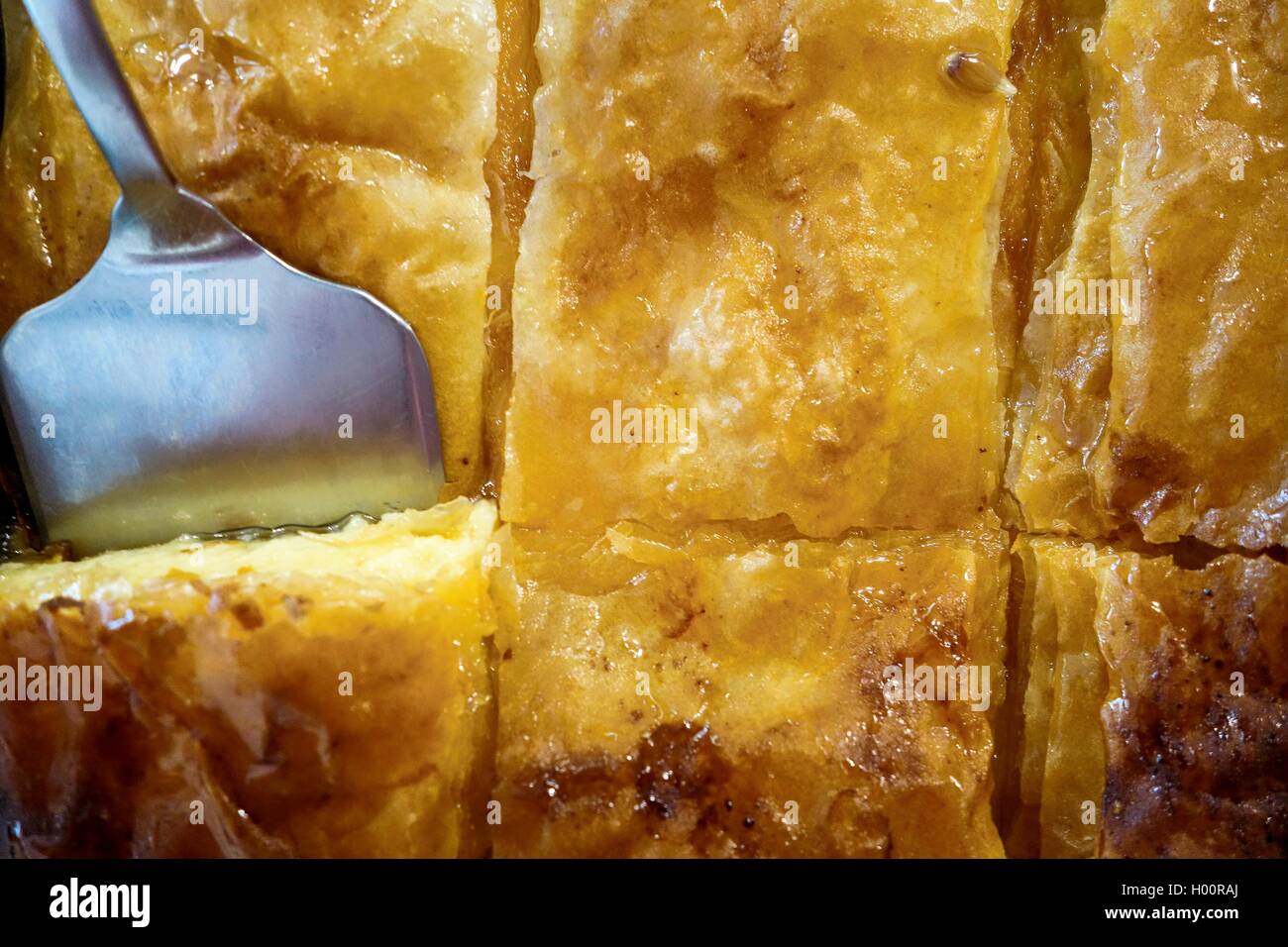 Greek Cuisine. Bougatsa (Custard Pie with Phyllo and Honey Stock Photo ...