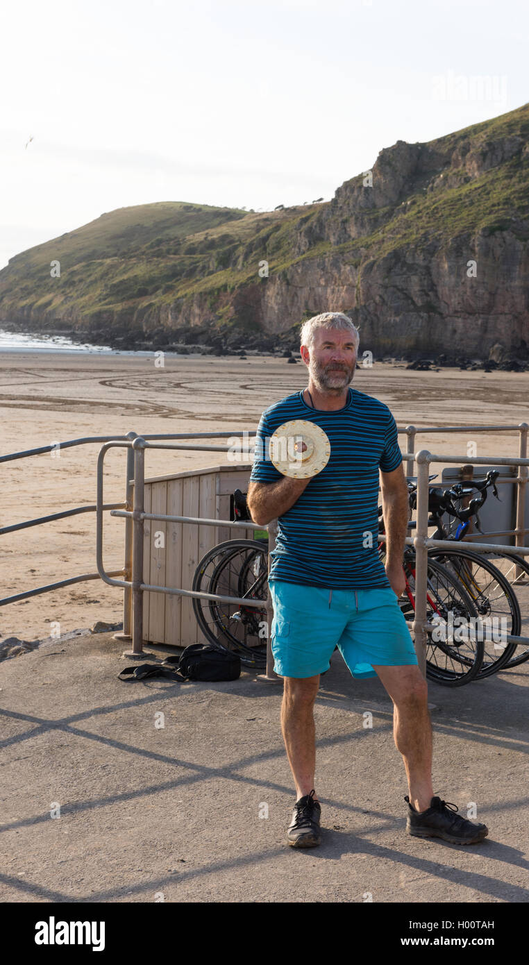 International Snow and Sand Artist Simon Beck after completing a sand ...