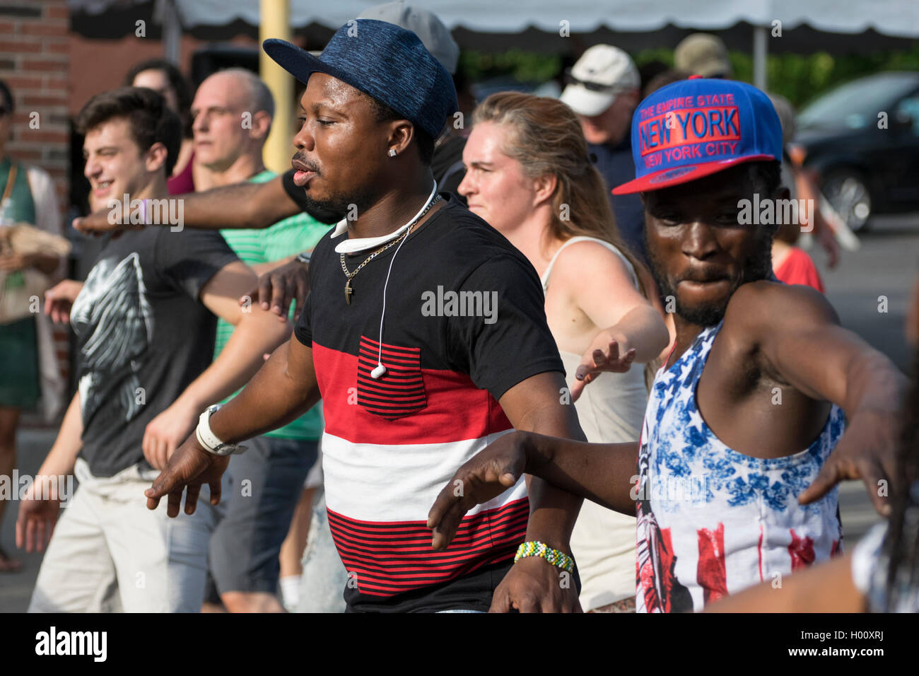African American men dancing at a street fair Stock Photo - Alamy