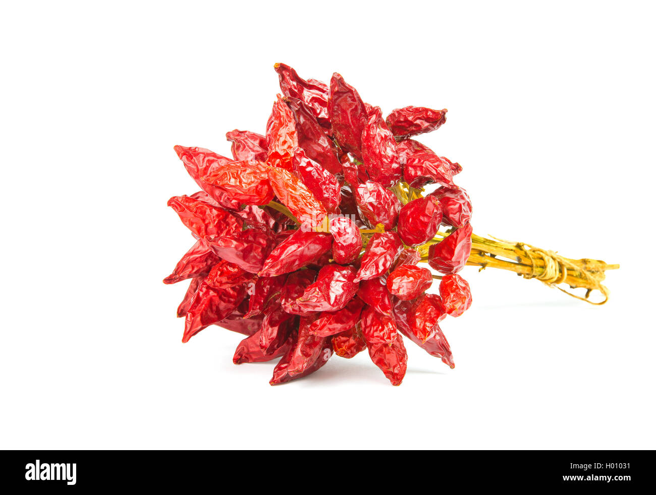 Bunch of red dried hot chili pepper on white background Stock Photo - Alamy