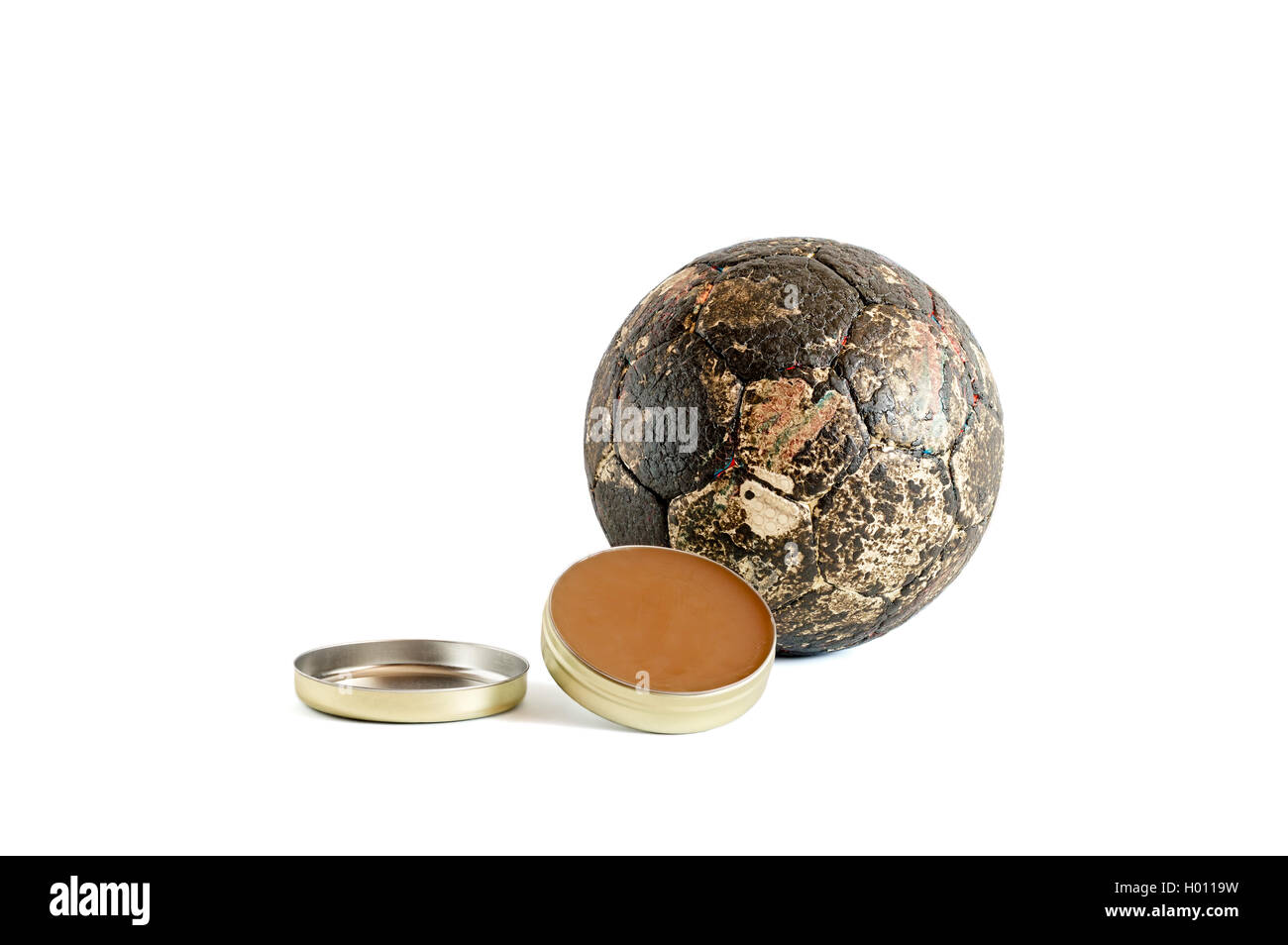 Can of handball wax near a dirty handball ball isolated on white Stock ...