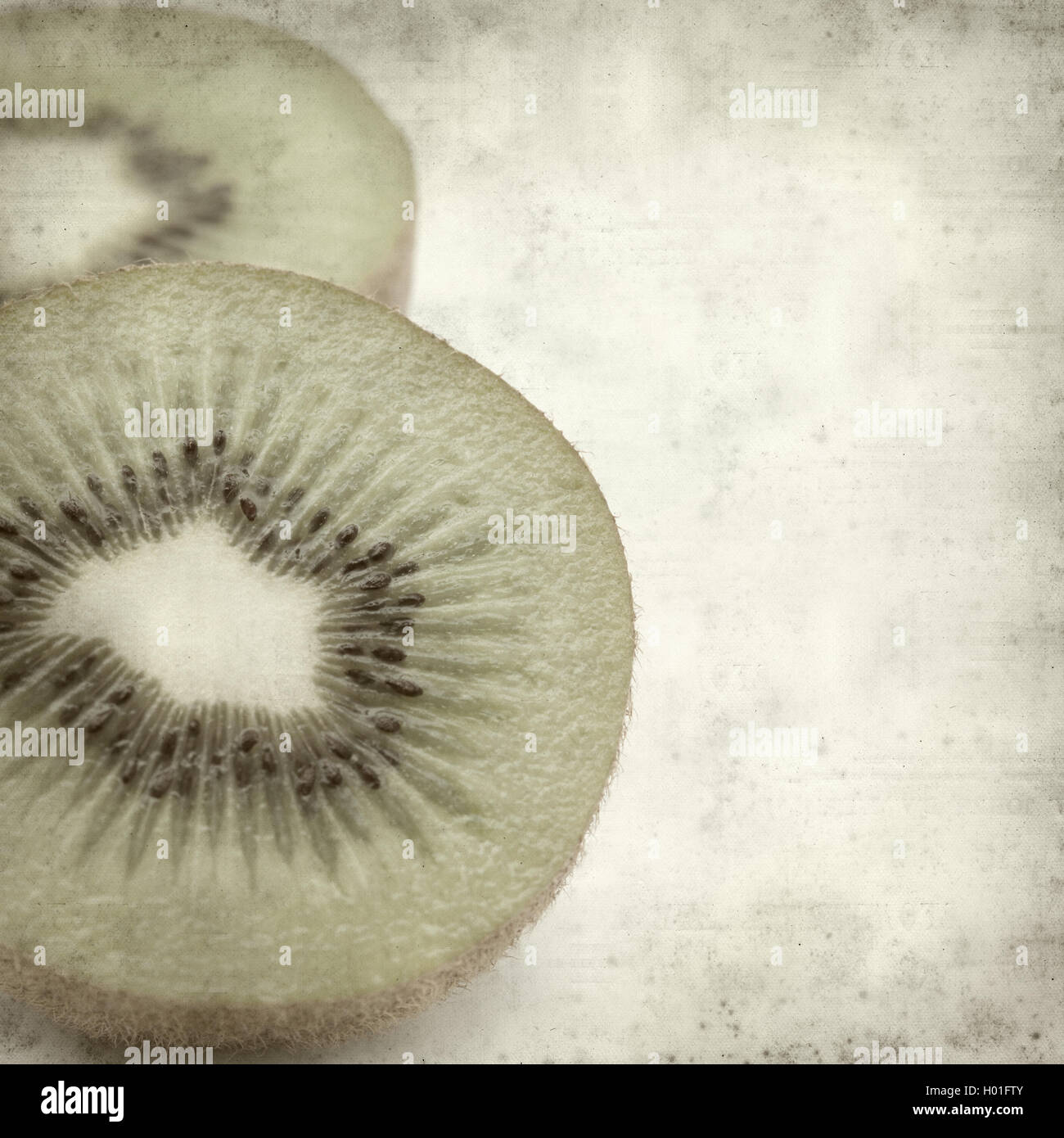textured old paper background with fresh green kiwifruit Stock Photo ...