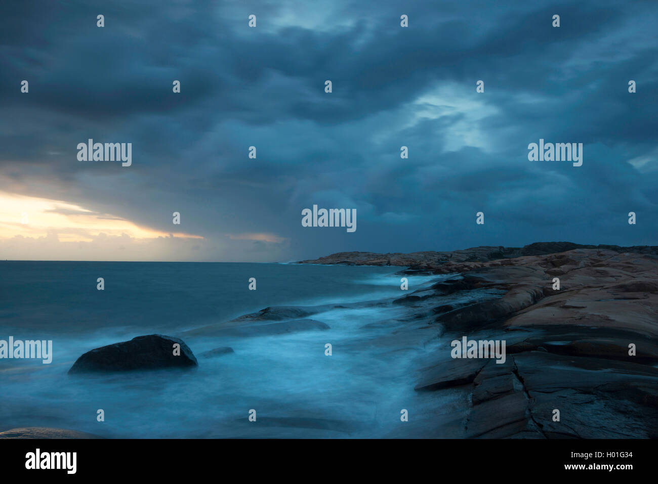rain clouds at the beach, Sweden, Bohuslaen, Smoegen Stock Photo - Alamy