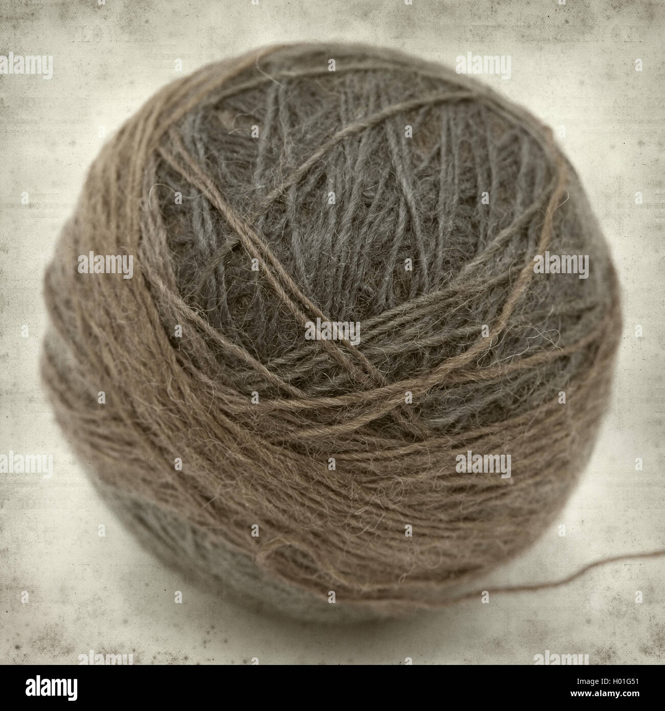 textured old paper background with thin variegated knitting wool Stock ...