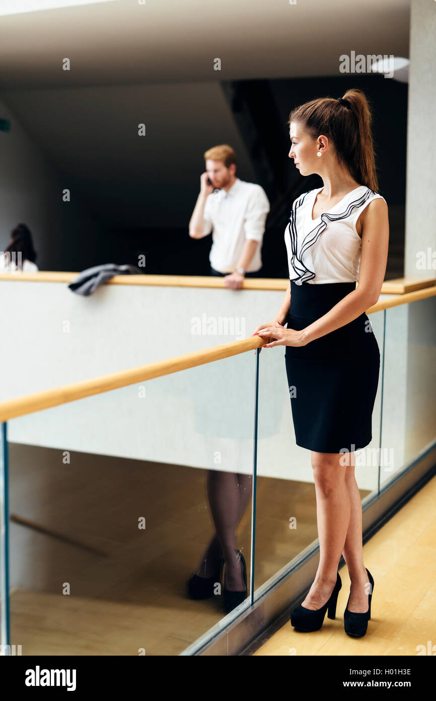 Beautiful businesswoman and her colleague Stock Photo - Alamy