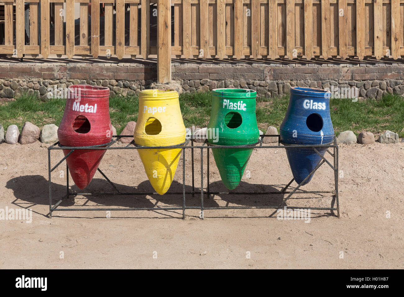 Four bins for separate waste collection Stock Photo - Alamy