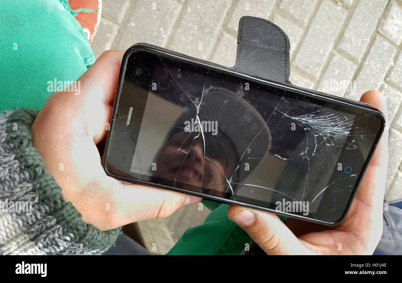 Broken display mobile in hand hi-res stock photography and images - Alamy
