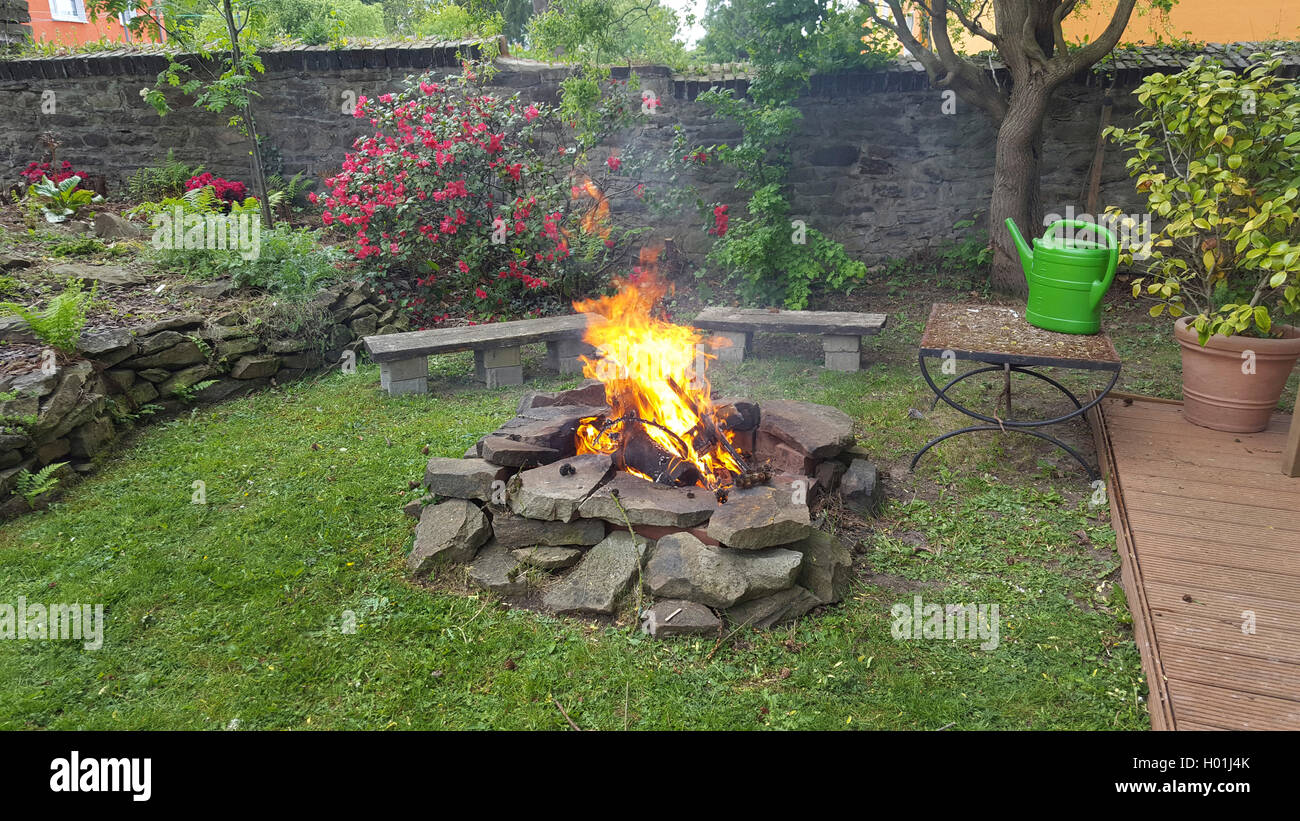 bonfire in a garden, Germany, North Rhine-Westphalia Stock Photo - Alamy