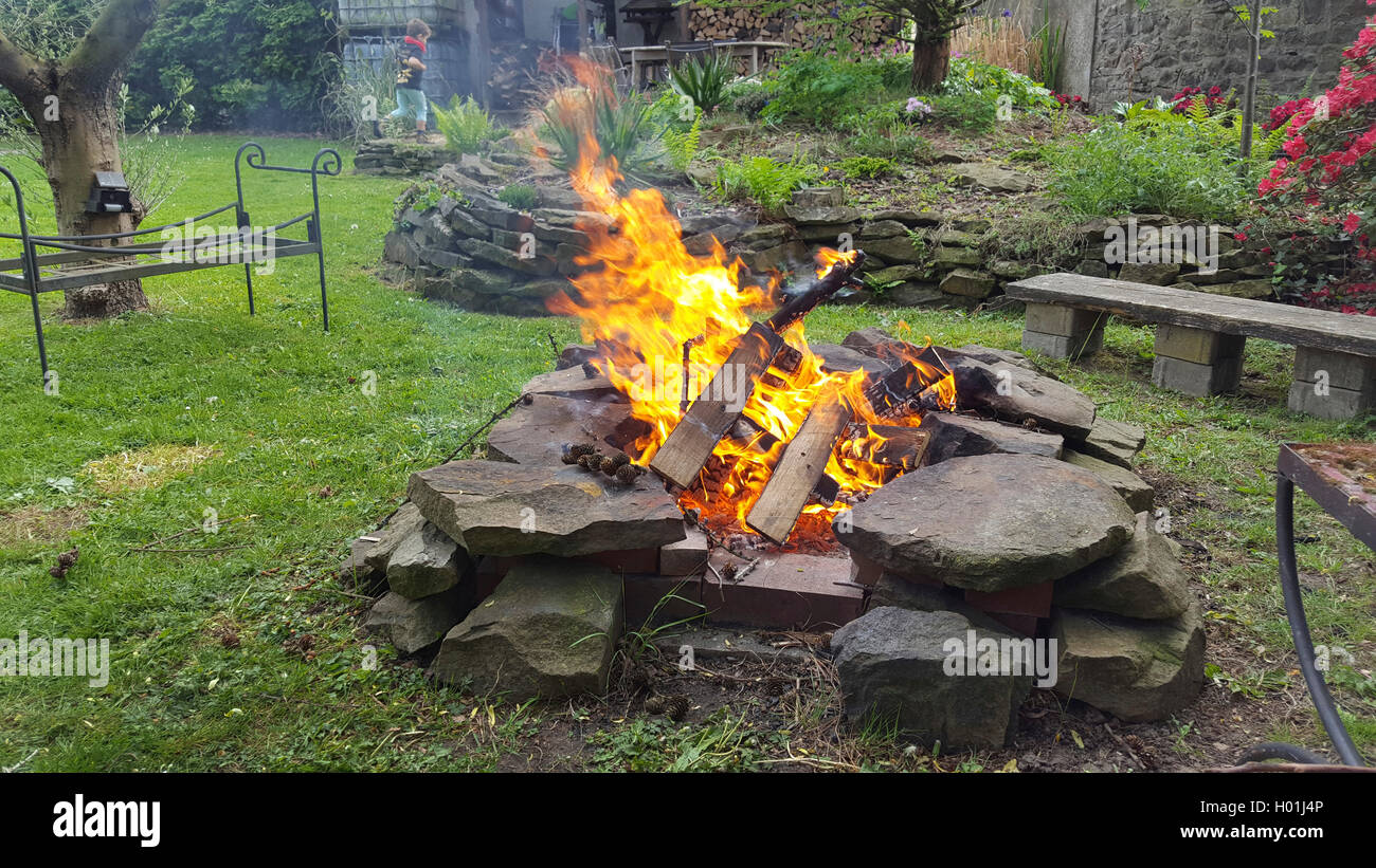bonfire in a garden, Germany, North Rhine-Westphalia Stock Photo - Alamy