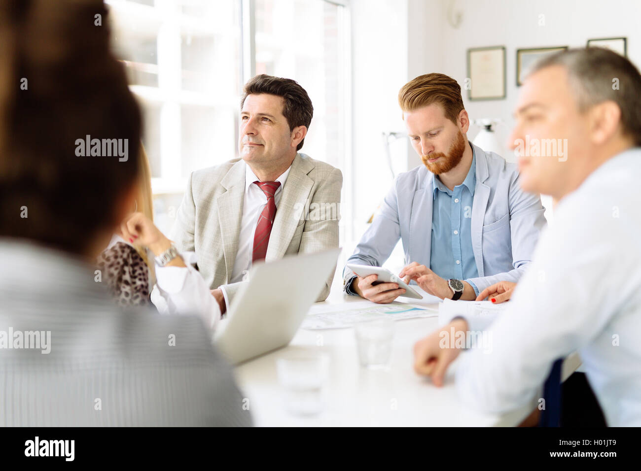 People with phones and computer hi-res stock photography and images - Alamy