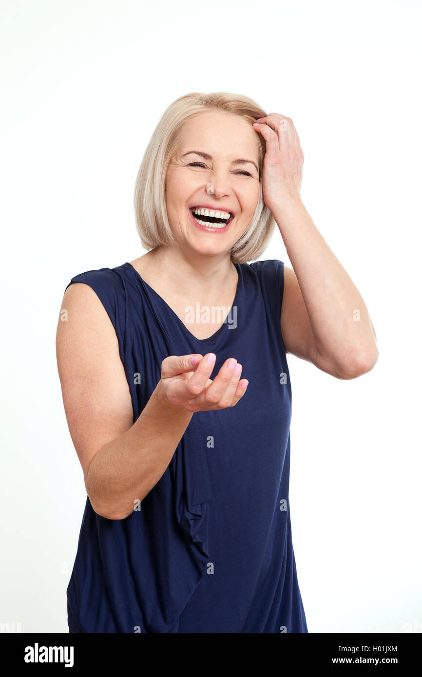 Friendly smiling middle-aged woman isolated on white background Stock Photo - Alamy