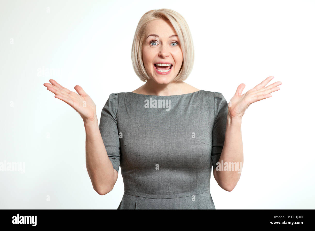 Surprised woman isolated on white background. Human face expression ...
