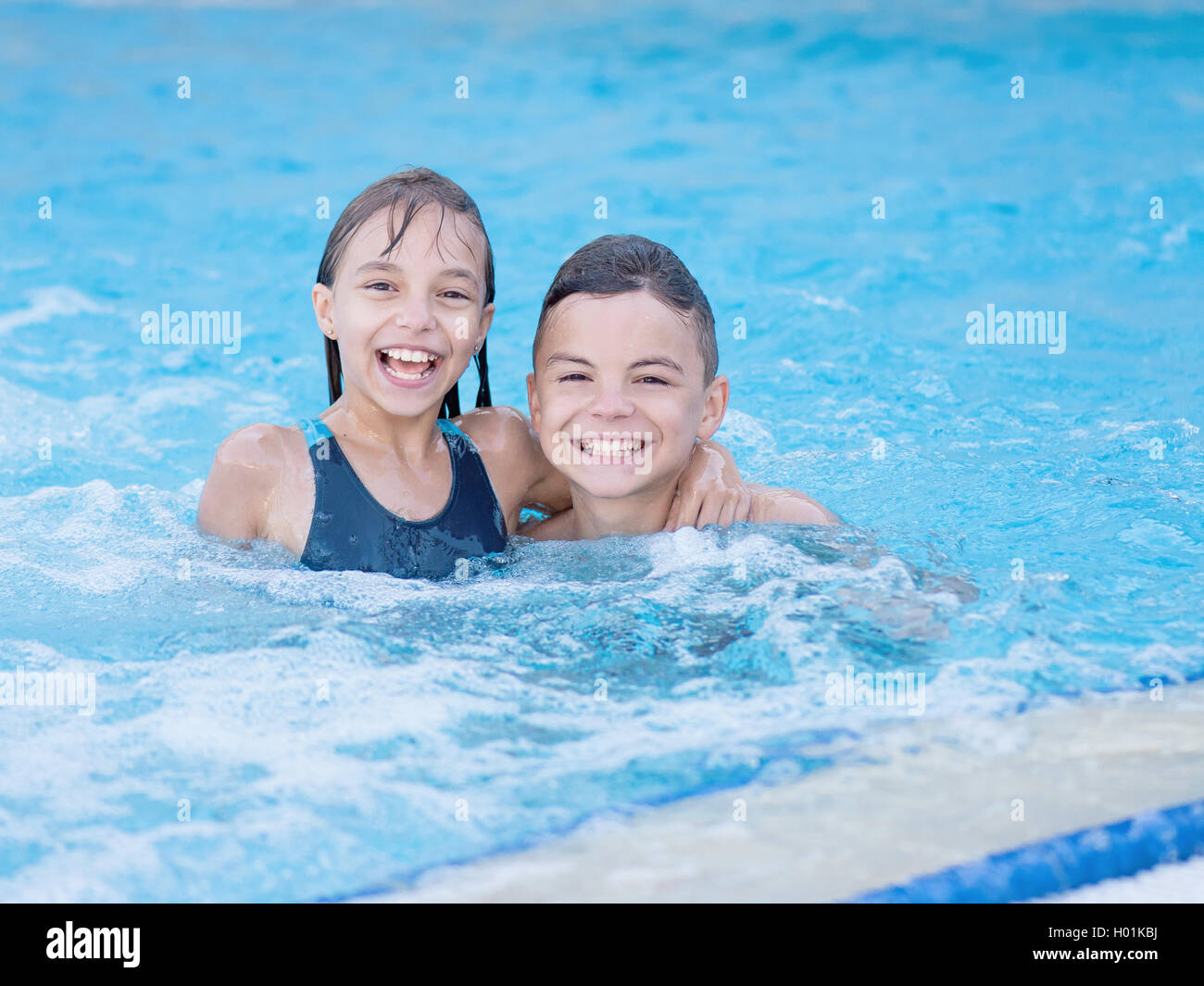 Children in pool Stock Photo - Alamy