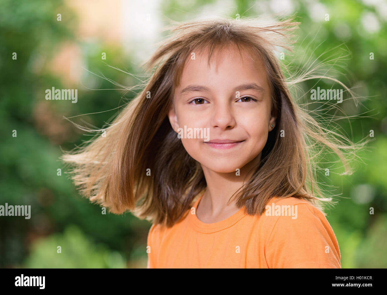 Portrait of smiling girl Stock Photo - Alamy