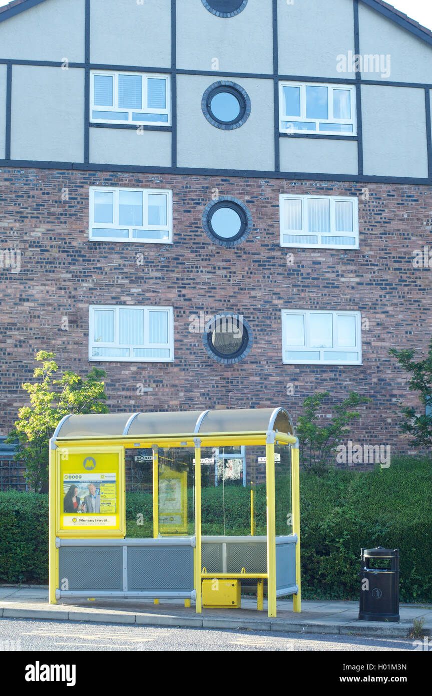 Yellow bus shelter and apartment block Bebington,Wirral.UK Stock Photo ...