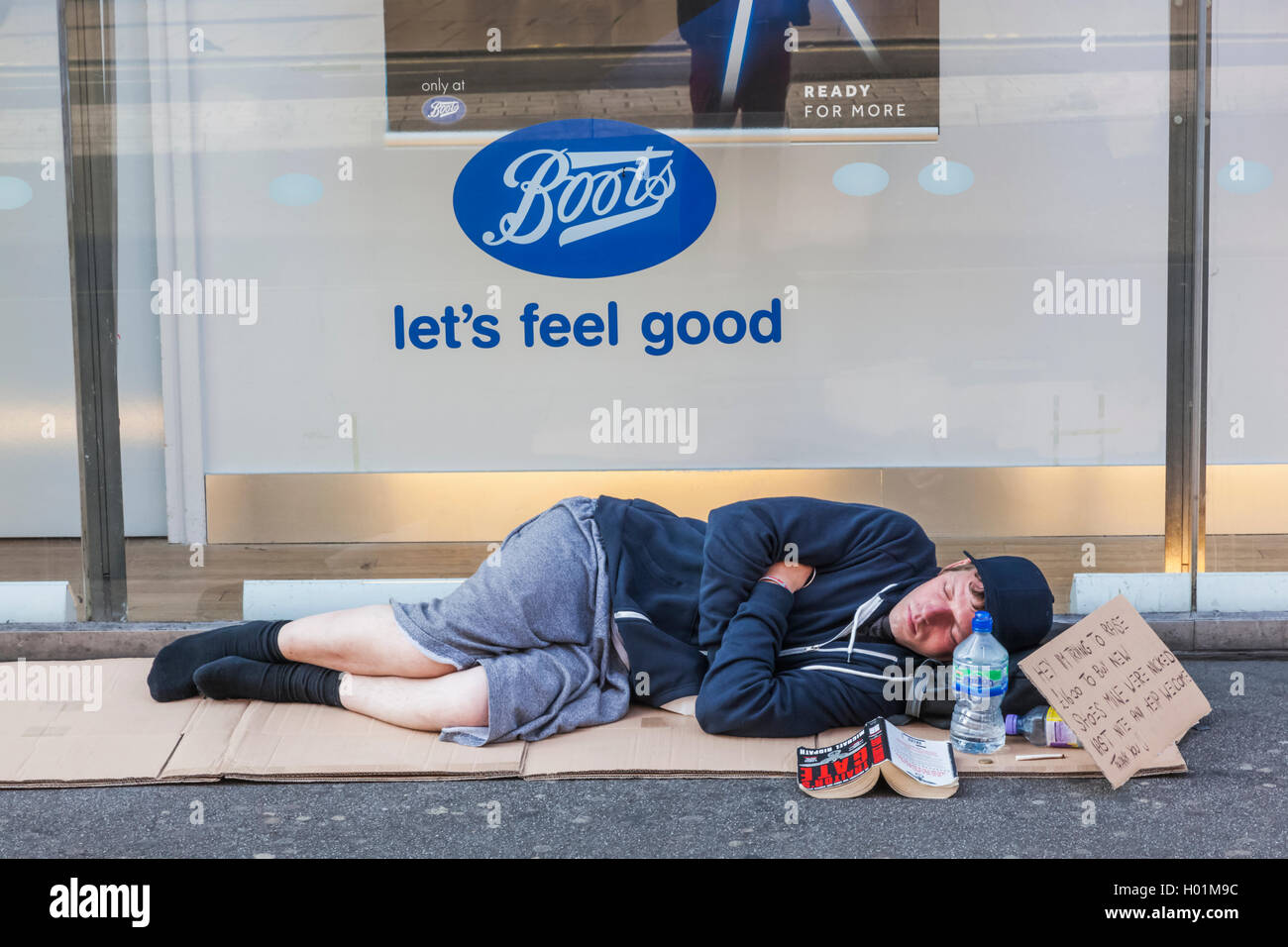 England, London, Oxford Street, Homeless Man Sleeping on Sidewalk Stock ...