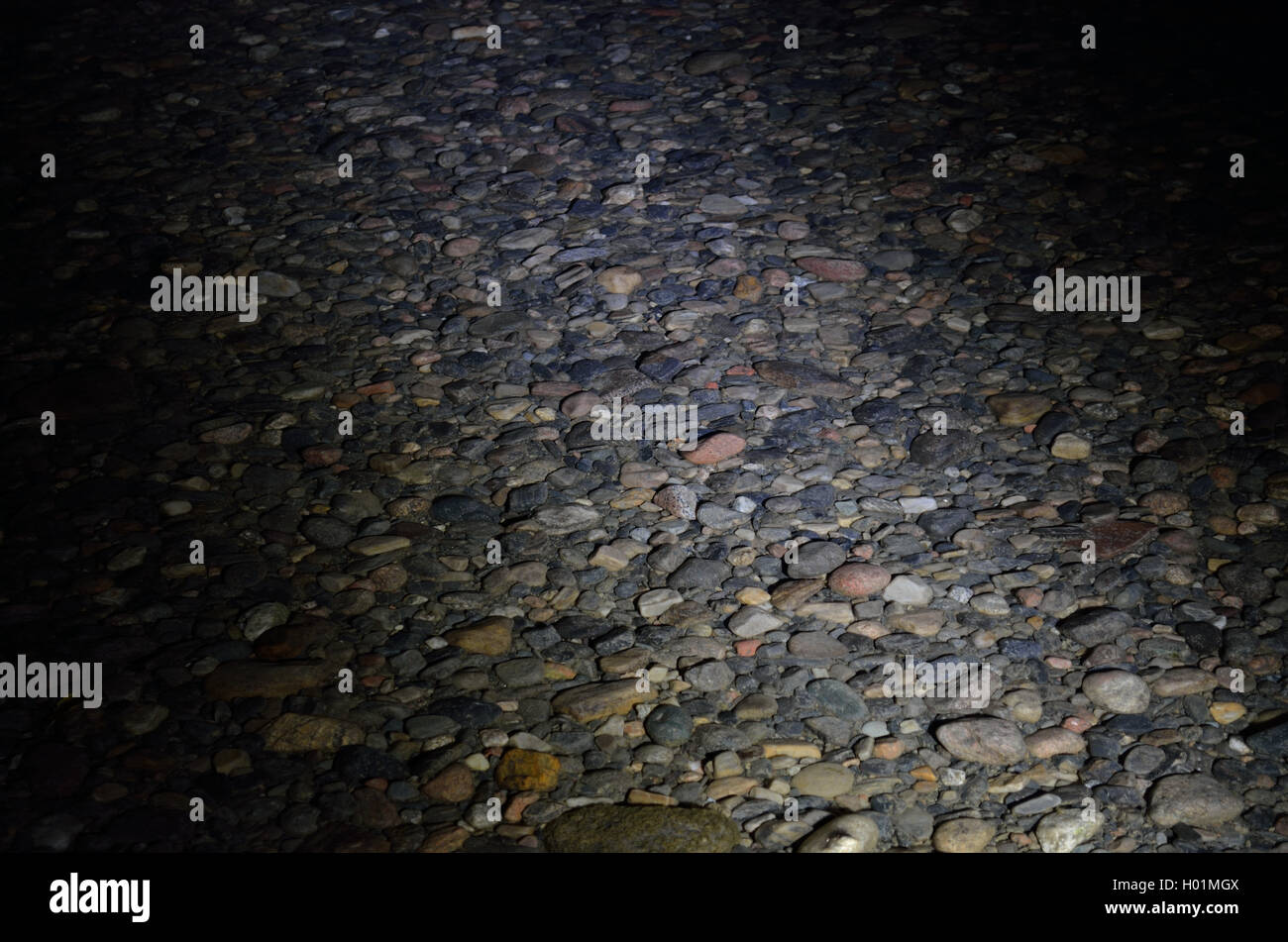 illuminated river rock at night under water Stock Photo - Alamy