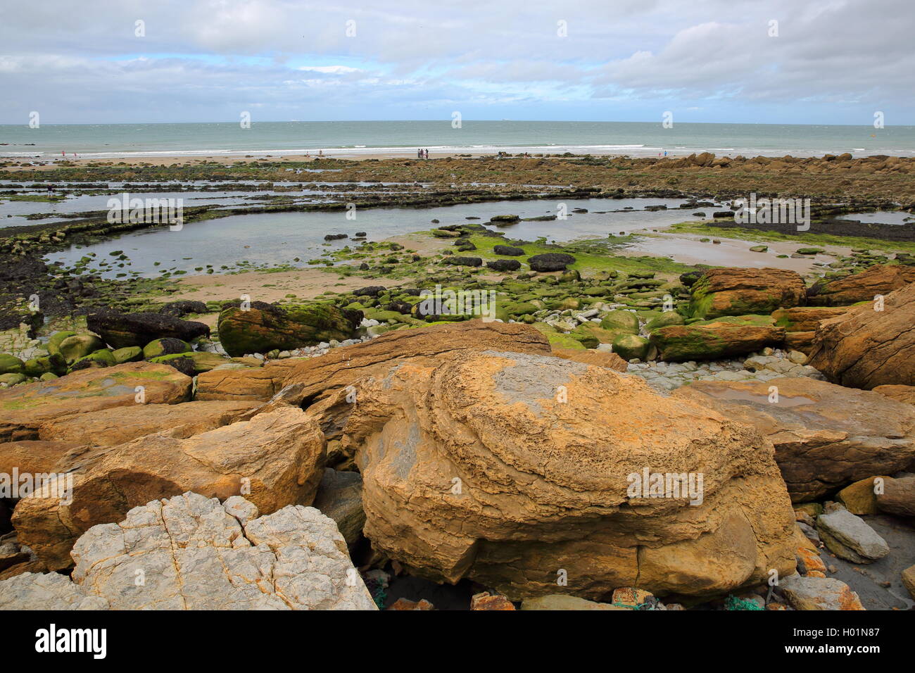 Cap Gris Nez, the beach at low tide with colourful rocks, Cote d'Opale ...