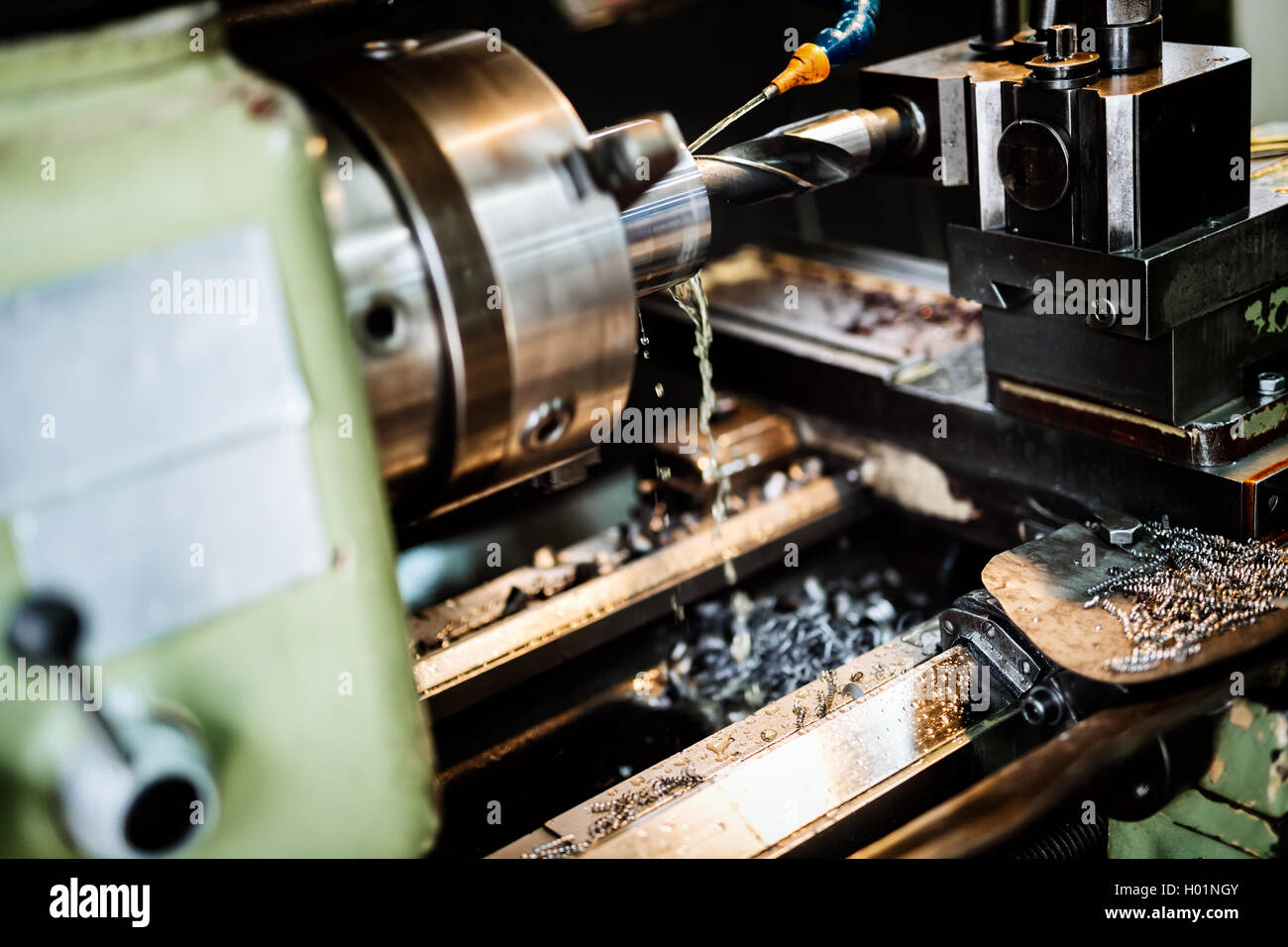 Automated drilling machines processing metalwork for assembly robots ...