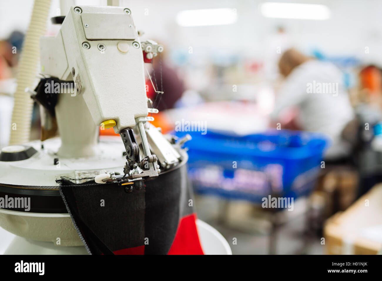 Linking machine in textile industry Stock Photo - Alamy