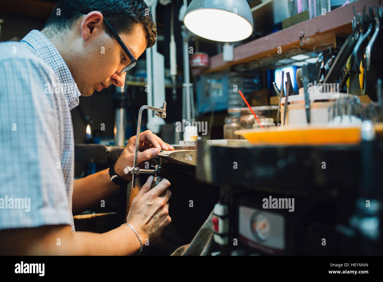 Hands man working grinder hi-res stock photography and images - Alamy
