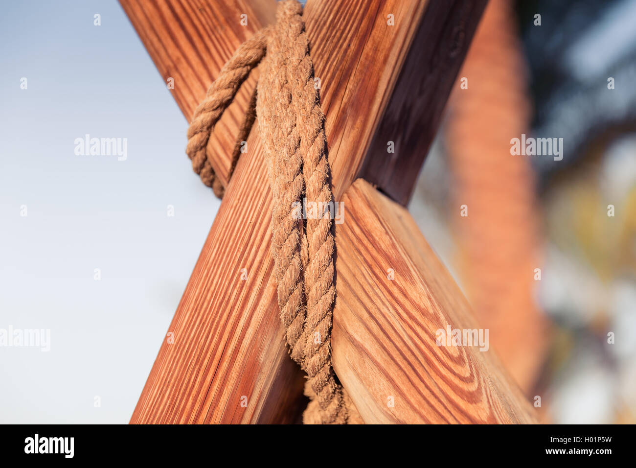 Wood construction with rope Stock Photo - Alamy