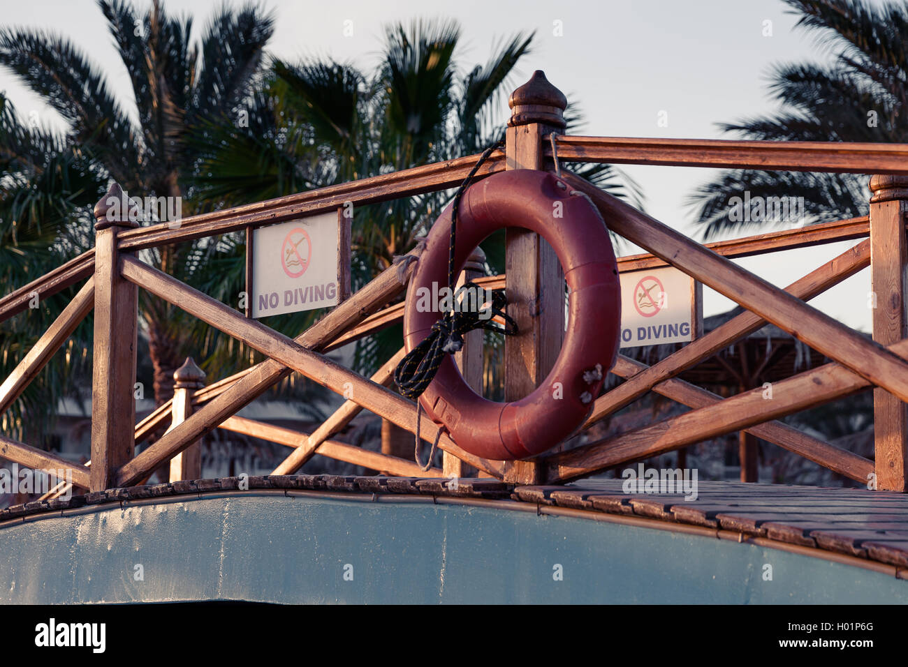Bridge over the pool Stock Photo - Alamy