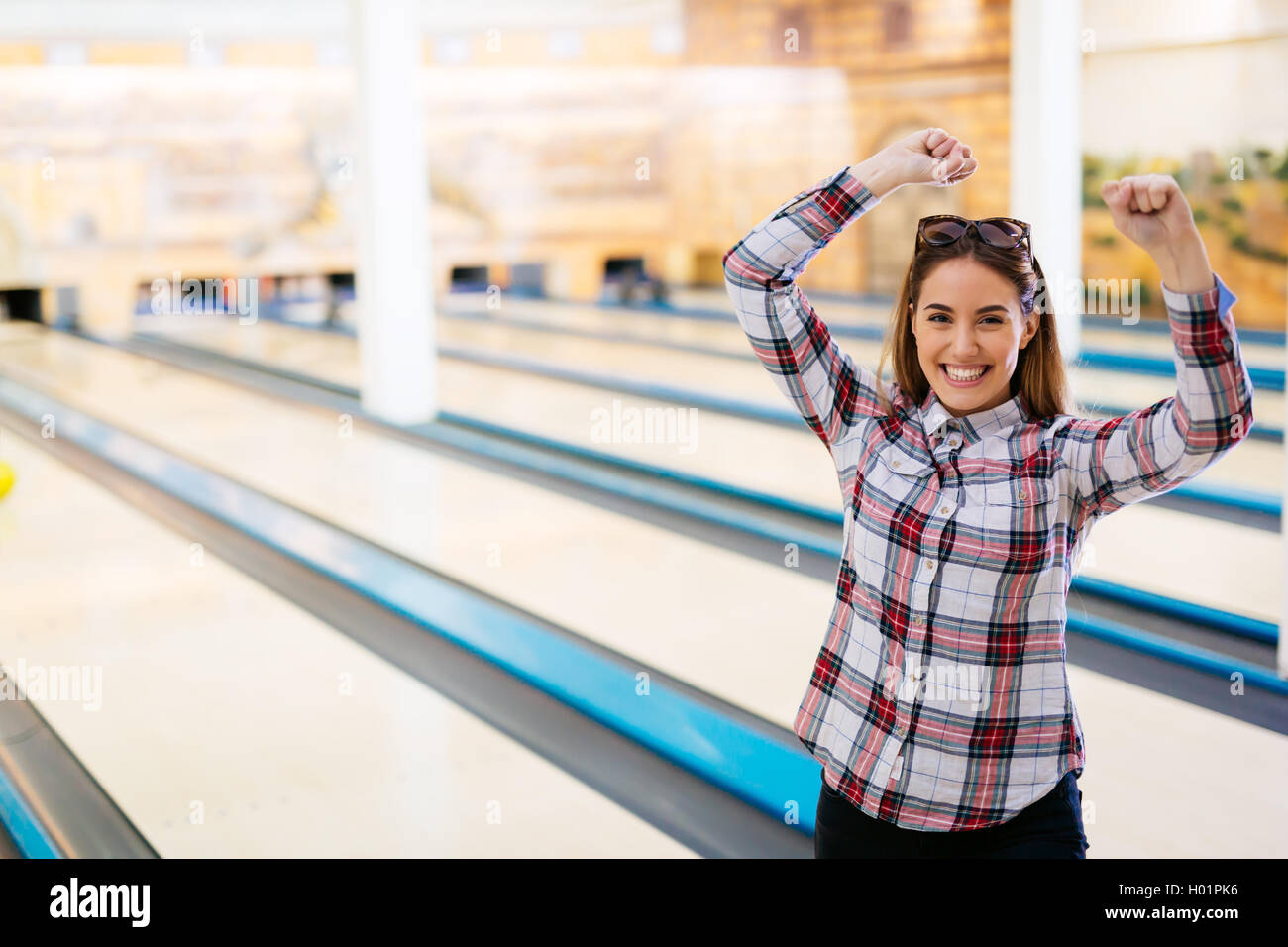 Happy woman celebrating success and achievements Stock Photo - Alamy