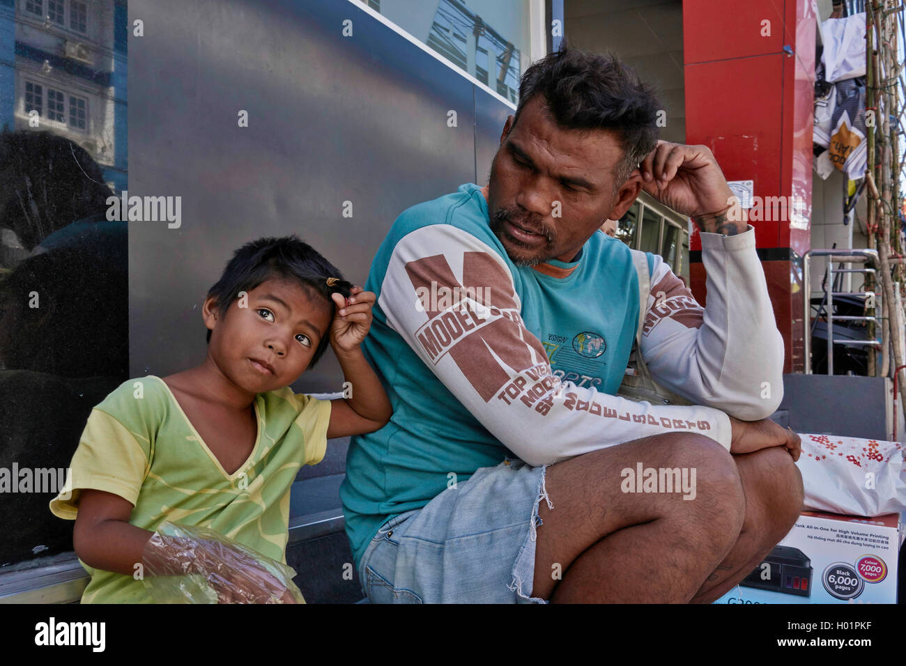 Thai father son hi-res stock photography and images - Alamy