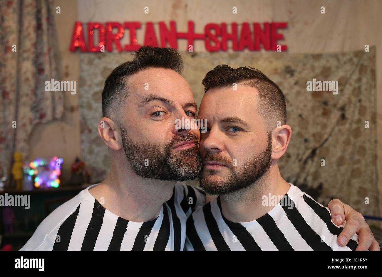 Pop art duo Adrian+Shane pose for pictures as they invite the public to join forces with them in ...