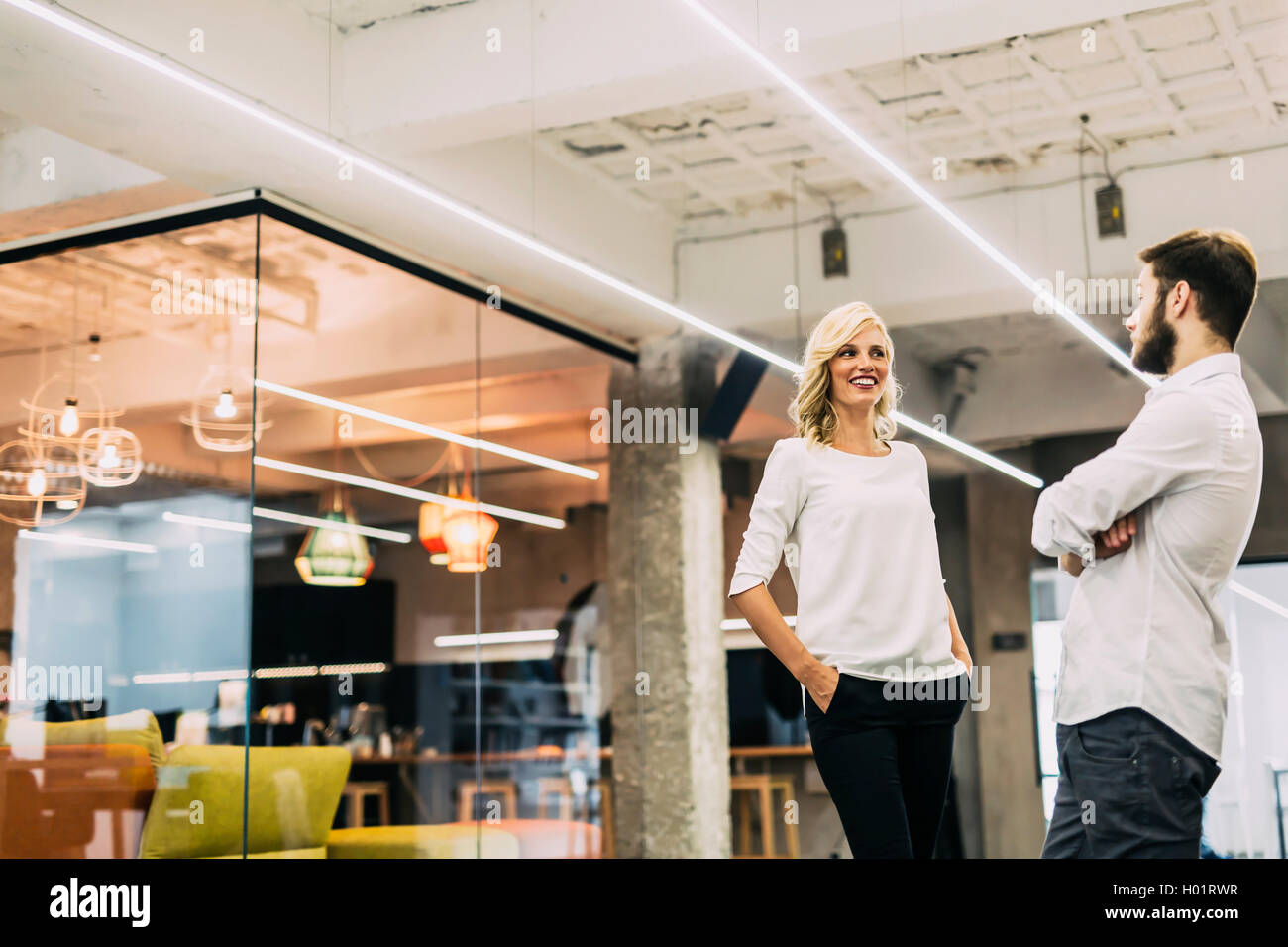 Office coworkers having a chat during lunch break in office Stock Photo ...
