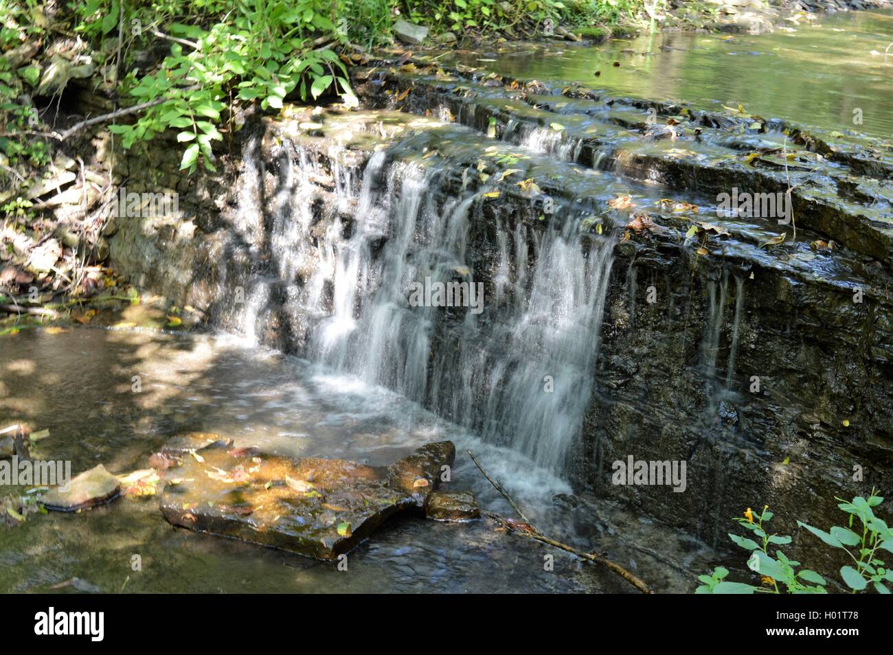 Waterfall in the Park Stock Photo - Alamy