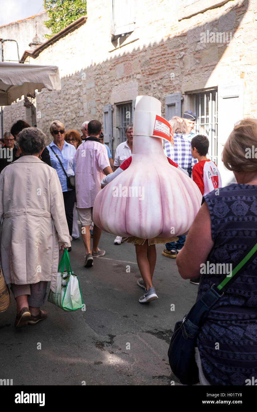 person in garlic costume Stock Photo - Alamy