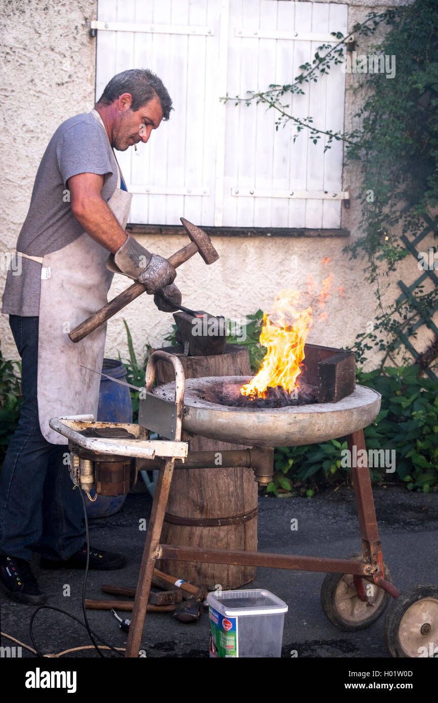 Blacksmith making a chisel, France Stock Photo - Alamy