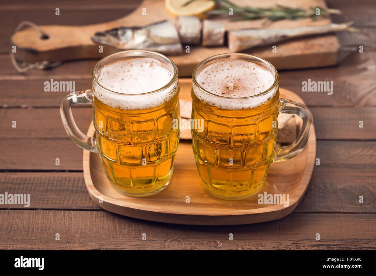 Two mugs of beer Stock Photo - Alamy