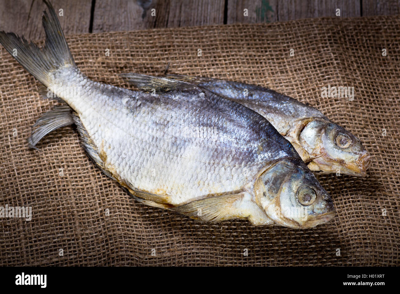 Two salted dry fish Stock Photo - Alamy