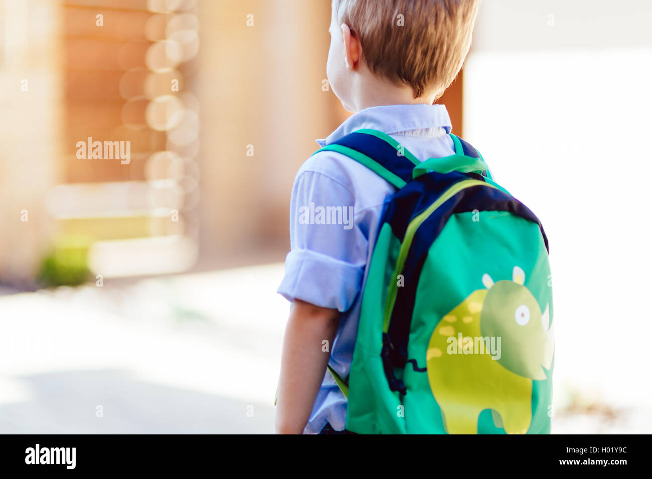 Child leaving home to his first day of kindergarten Stock Photo - Alamy