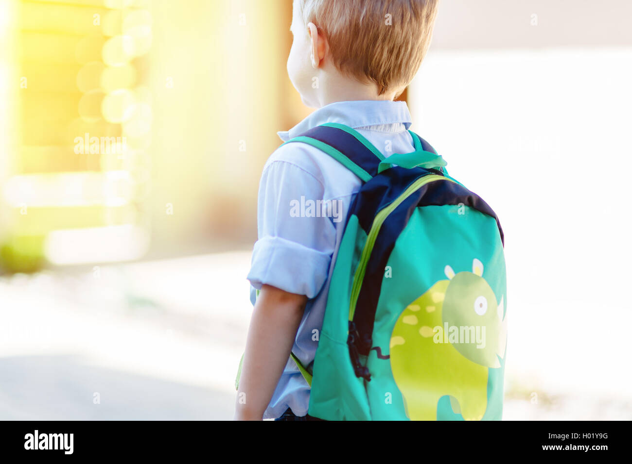 Child leaving home to his first day of kindergarten Stock Photo - Alamy
