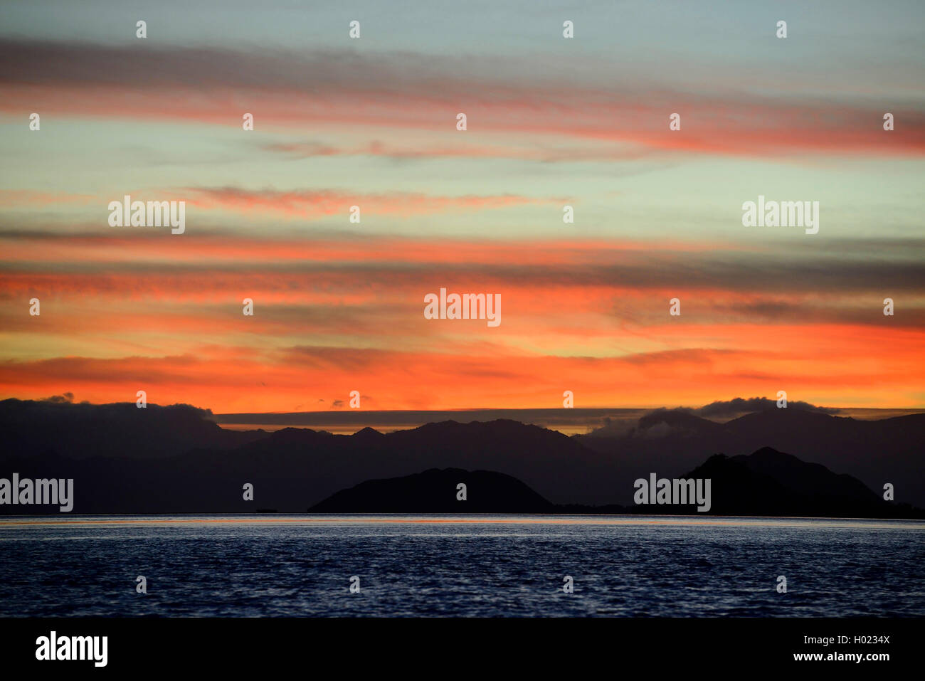 sunset over Komodo National Park, Indonesia, Komodo National Park Stock ...