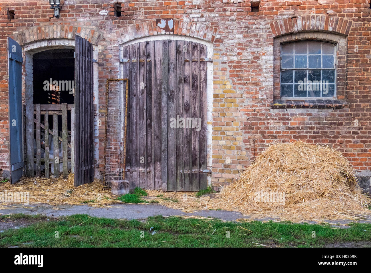 Restored old brick barn houses geese at night at Gut Boltenhof Hotel ...