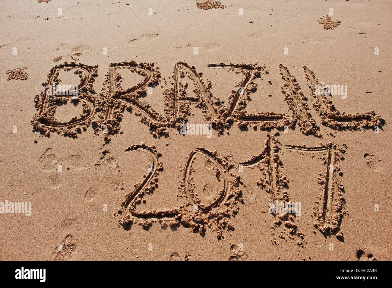 "Brazil 2017" written in the sand on the beach Stock Photo - Alamy