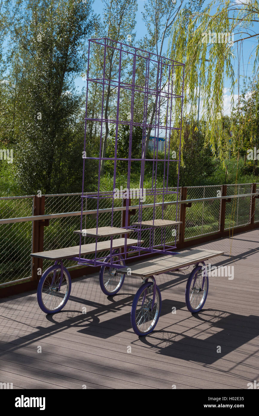 Artistic Purple Wheel Cart with Wooden Board inside Park Stock Photo ...
