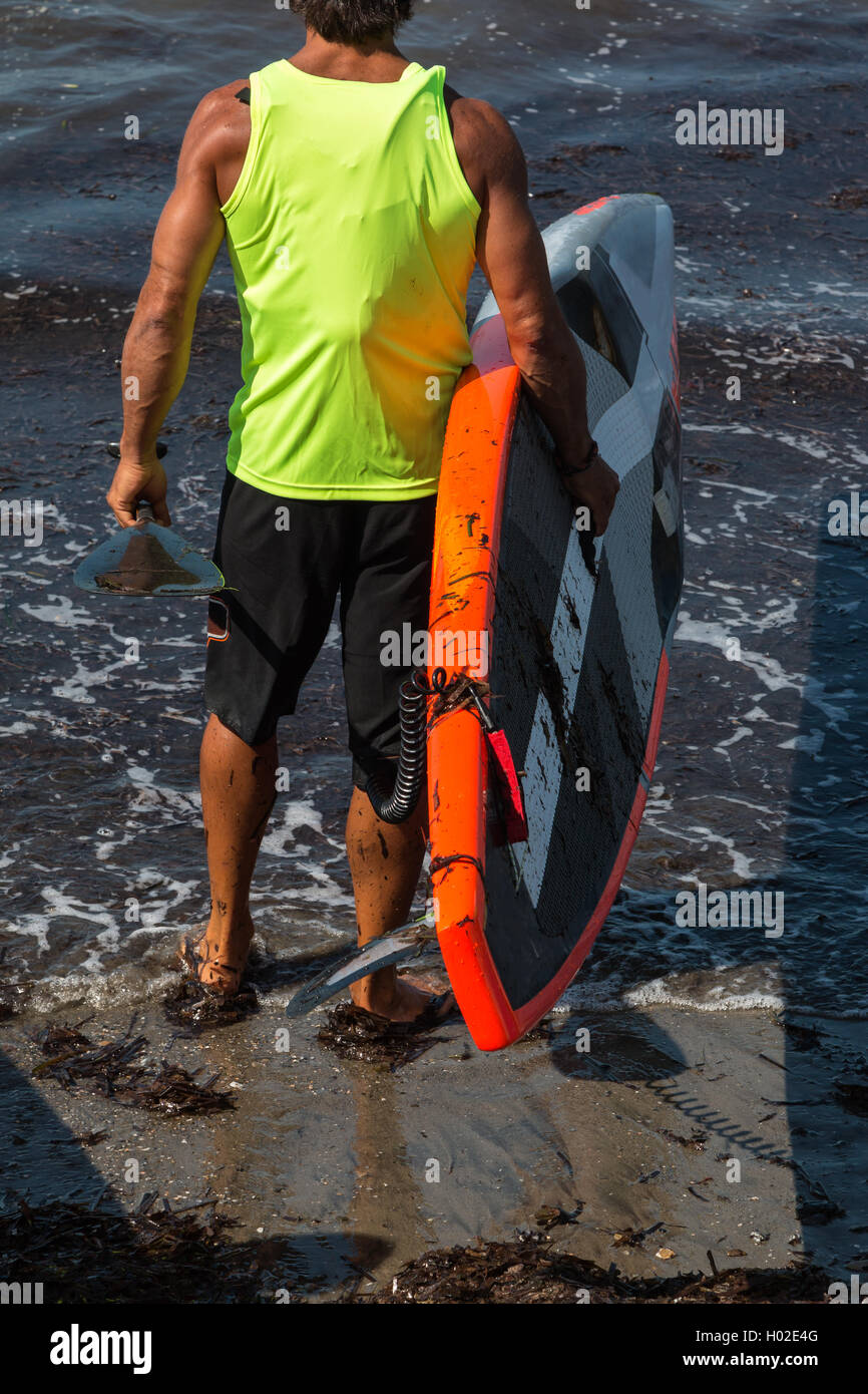 Man in Shoreline with His Board Underarm before Surfing in the Sea ...