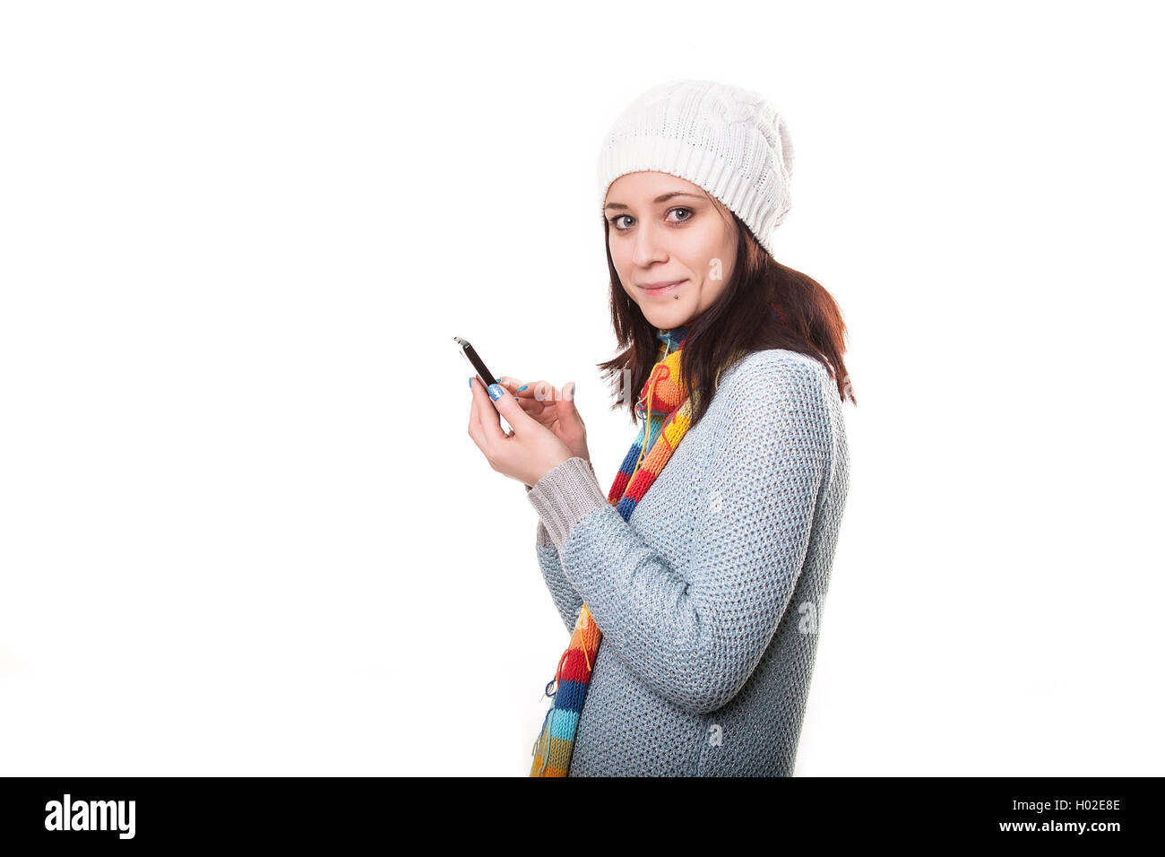 Portrait of one person sending a message by mobile phone on isolated ...