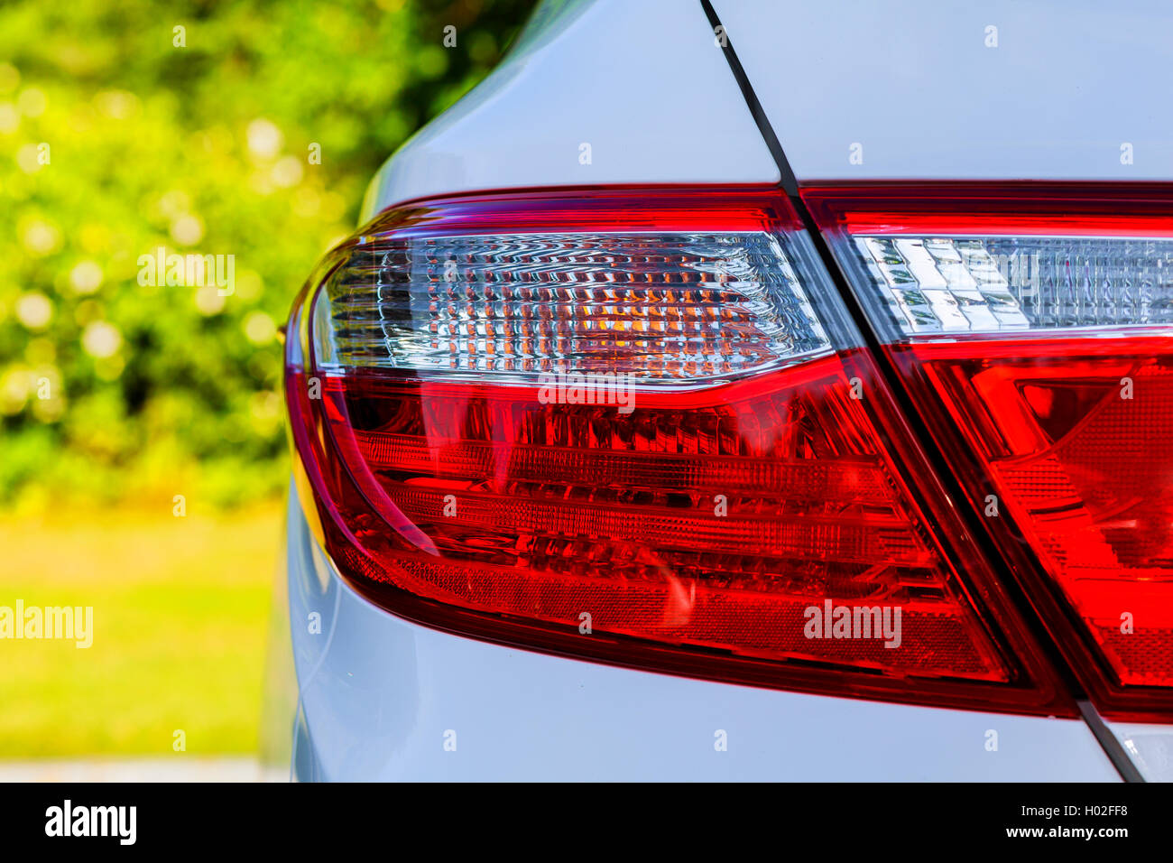 backlight of white car Stock Photo - Alamy