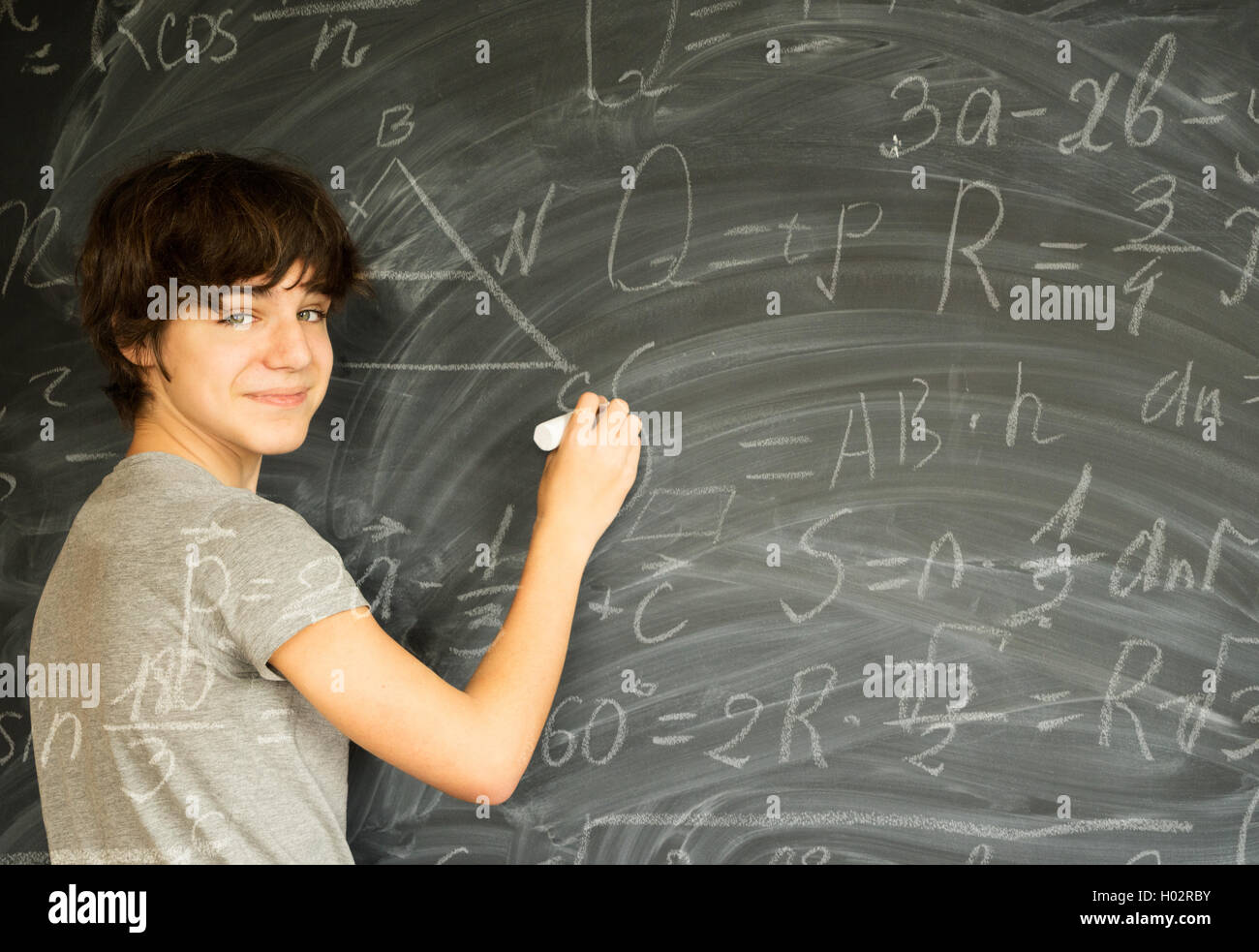 Teenager boy getting an idea Stock Photo - Alamy